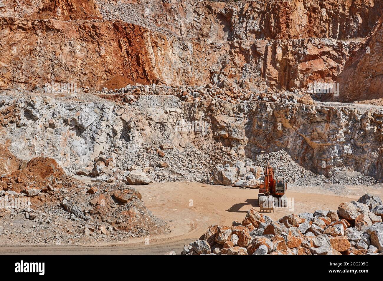 Heavy excavator on a quarry. Excavation machinery. Earthmover Stock ...