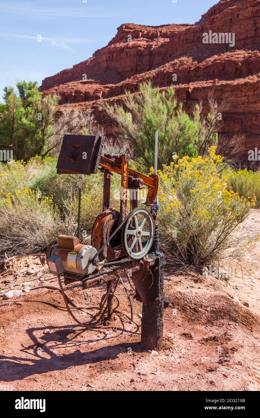 A shallow oil well with a very small pump jack in southeastern Utah ...