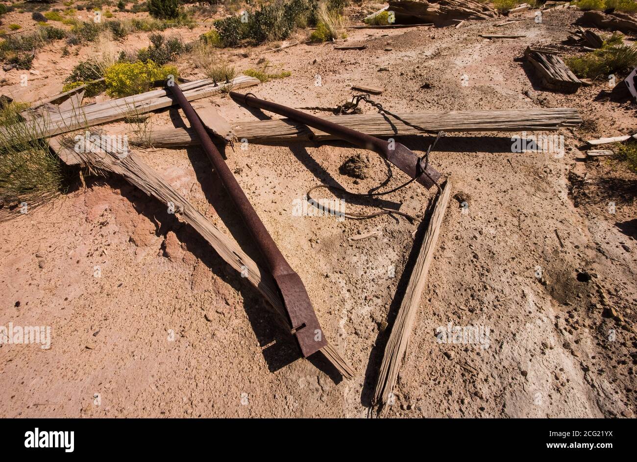 Metal supports and wooden crossbars in the wreckage of a 1920's era ...