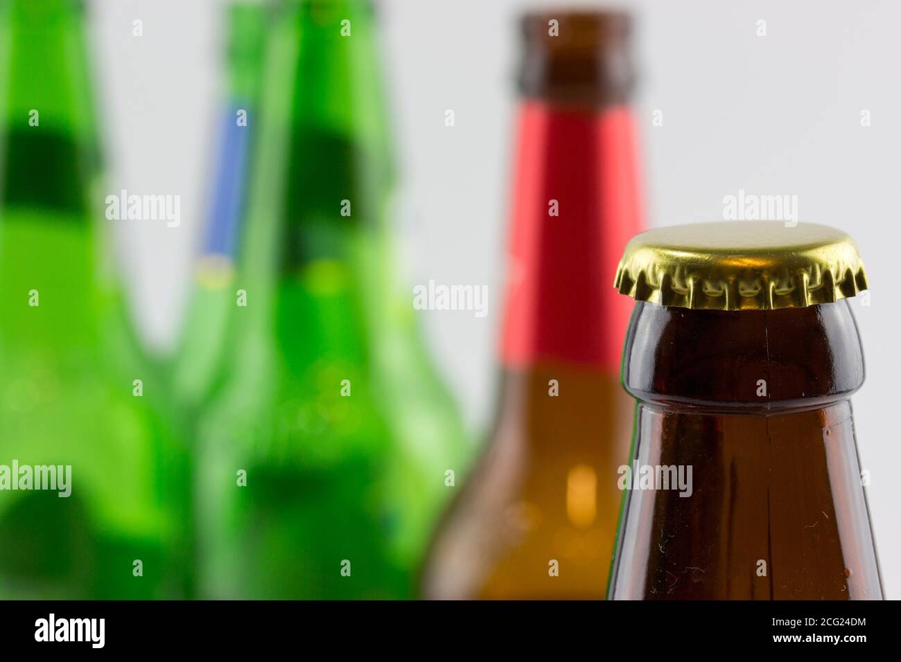 Colorful empty beer bottles, lots of empty beer bottles. Closeup ...