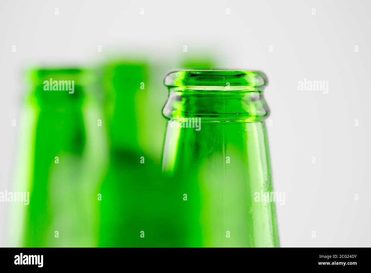 Colorful empty beer bottles, lots of empty beer bottles. Closeup ...