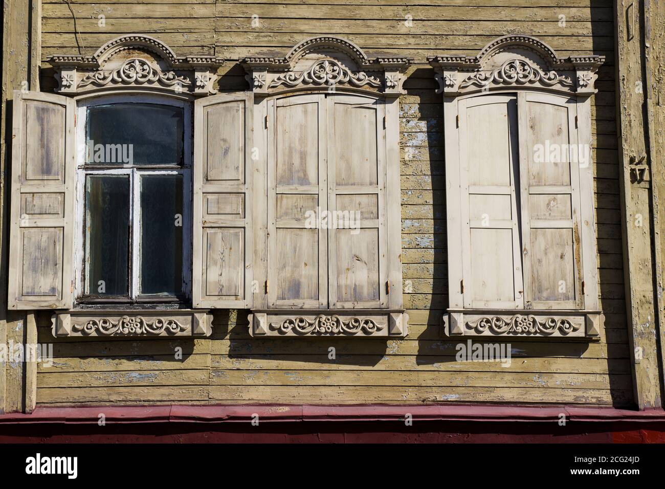 Carved wooden trim facade. Old historic house. Russian architecture ...