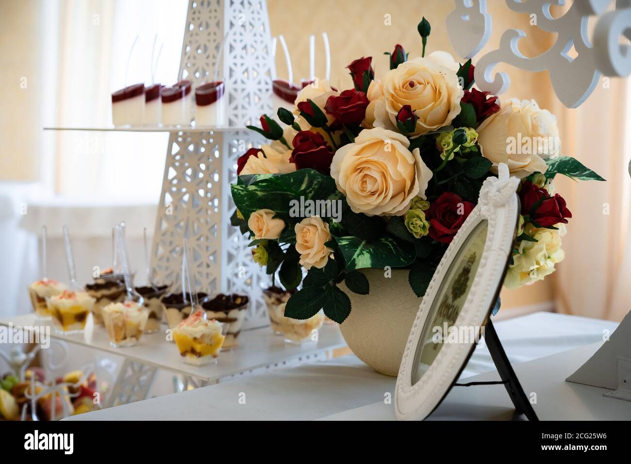 Wedding sweets, decorated tables, decorations and cupcakes, delicious ...