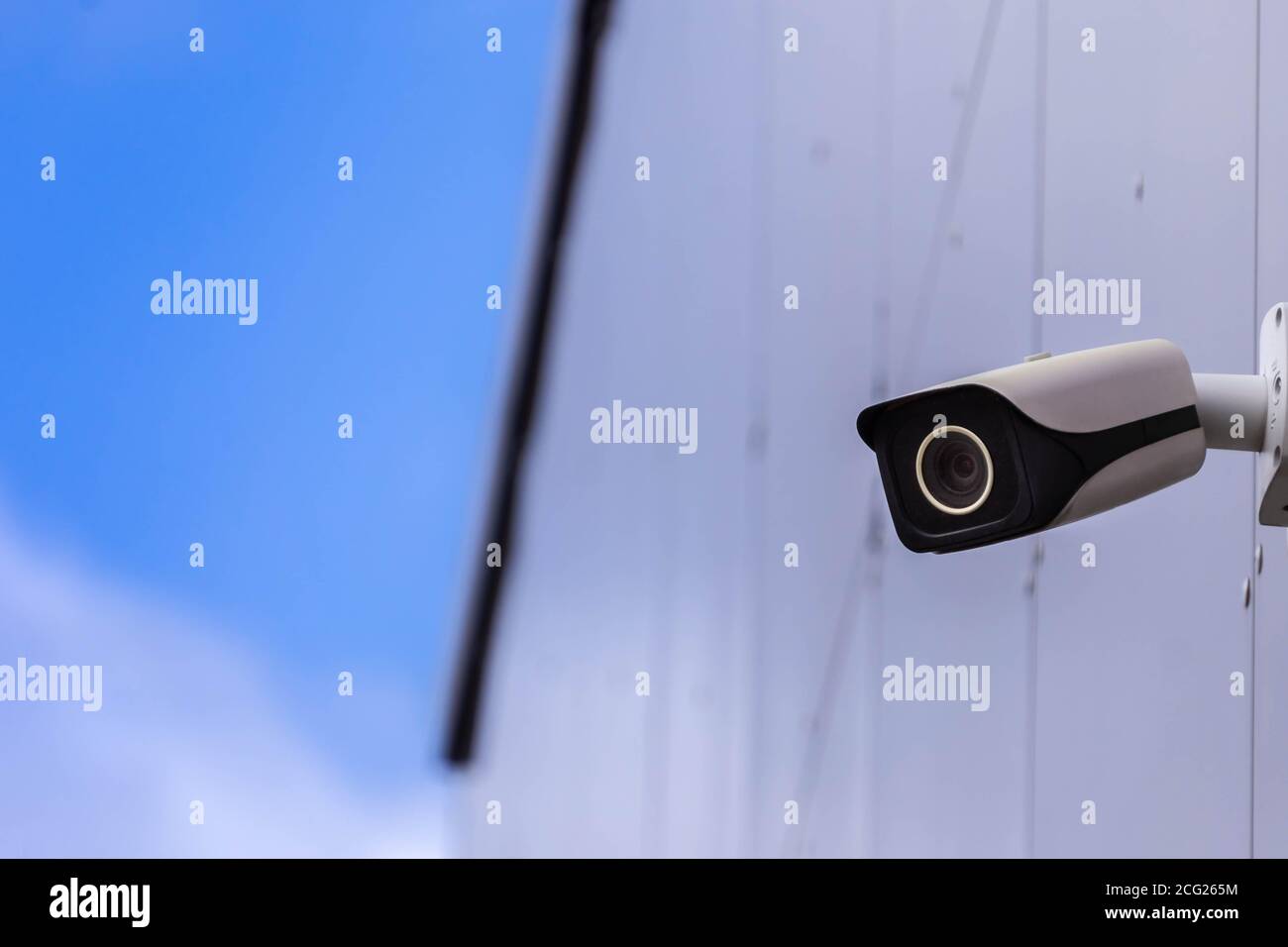 CCTV surveillance camera installed on modern building. Video equipment ...