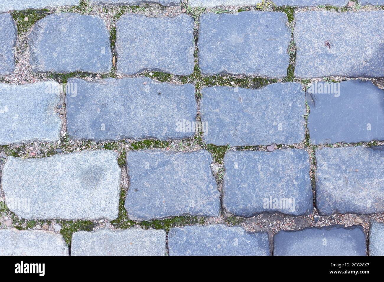 Gray, smooth granite paving stones. Paving stone background Stock Photo ...