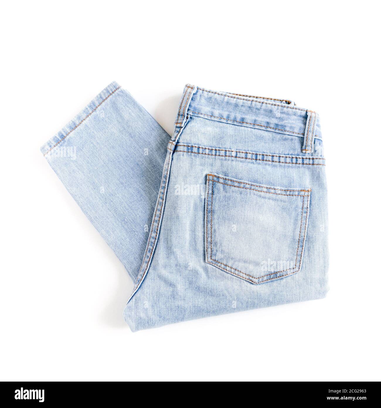 Blue jeans on a white background. Fashion composition on a white ...