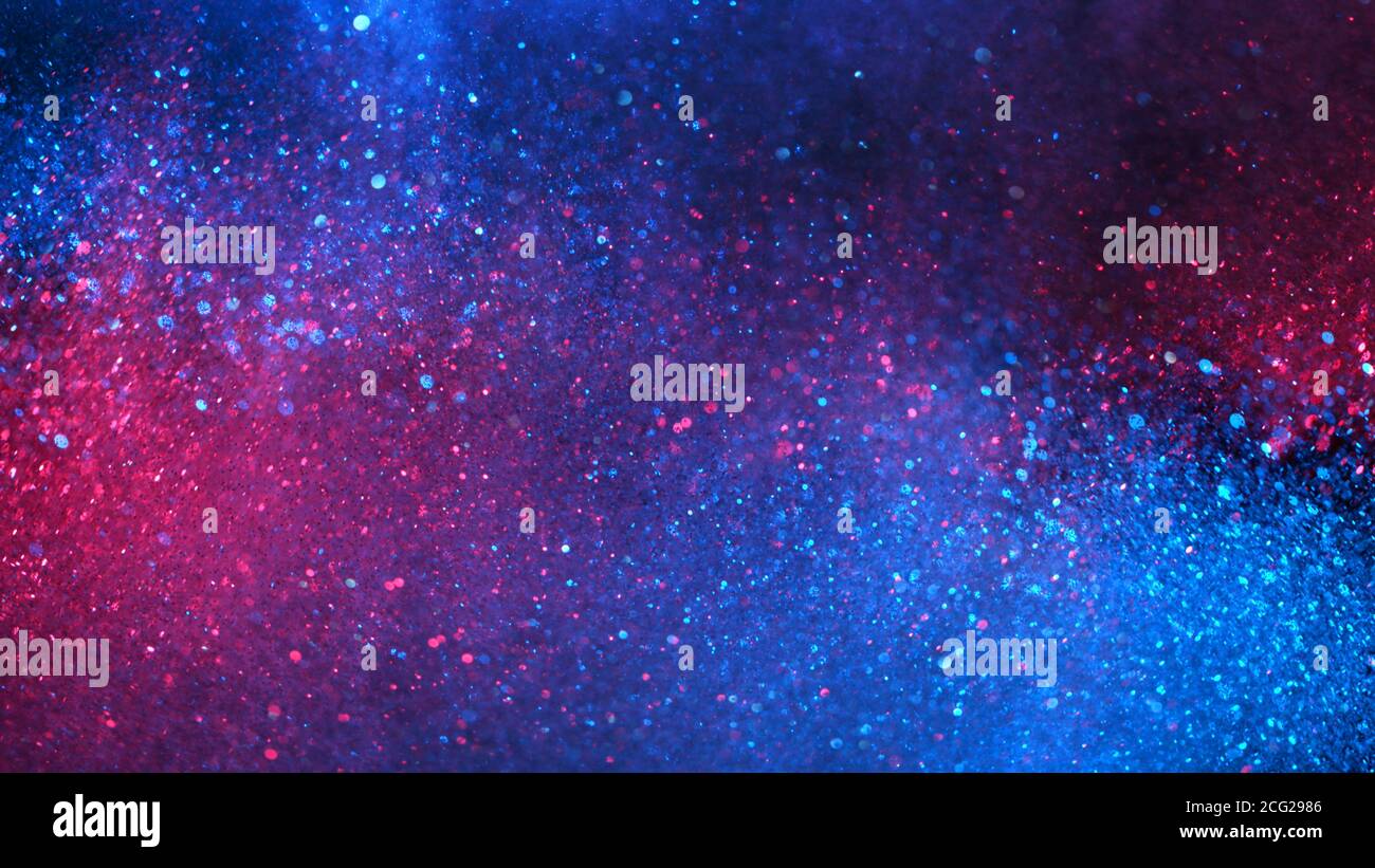 Abstract glittering powder background in neon lights Stock Photo - Alamy