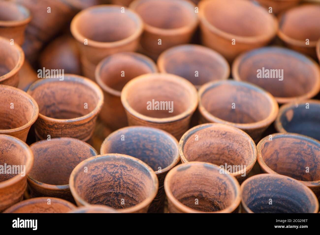 clay pots are in rows. view from above Stock Photo - Alamy