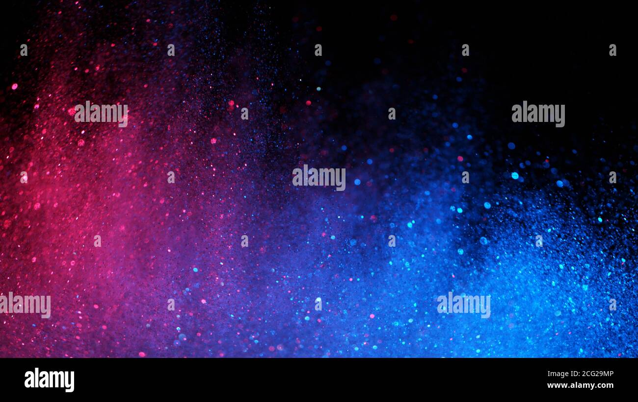 Abstract glittering powder background in neon lights Stock Photo - Alamy