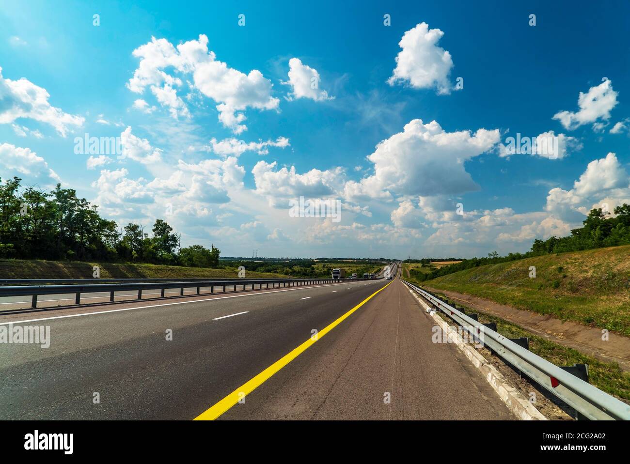 Two traffic lanes and a yellow dividing lane on the side of the M4 don ...