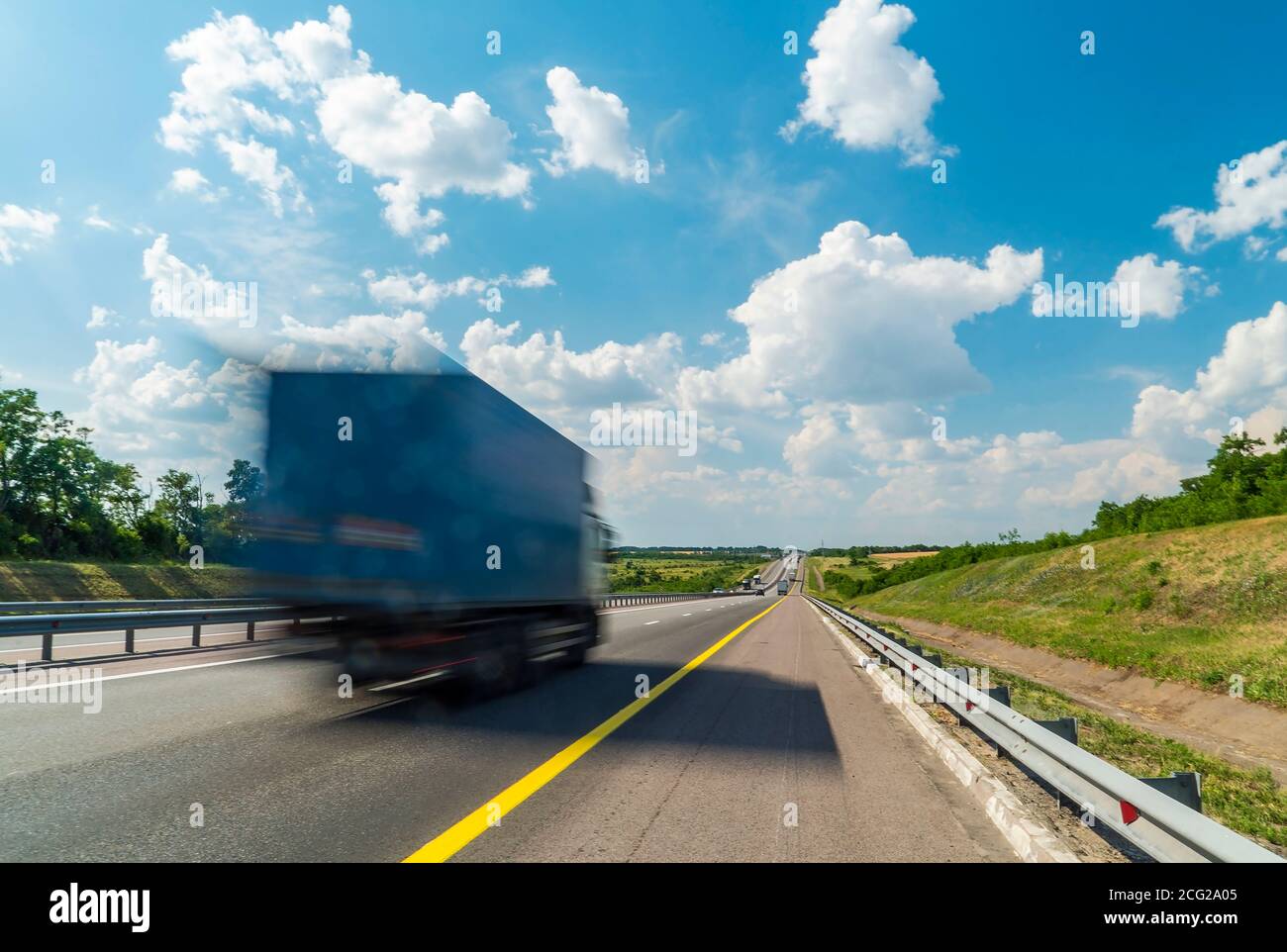 Two traffic lanes and a yellow dividing lane on the side of the M4 don ...