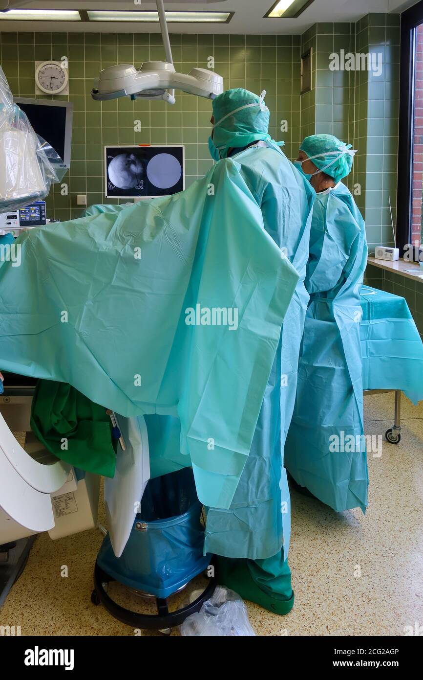 a urologist performs a renal endoscopy with an X-ray machine in an ...