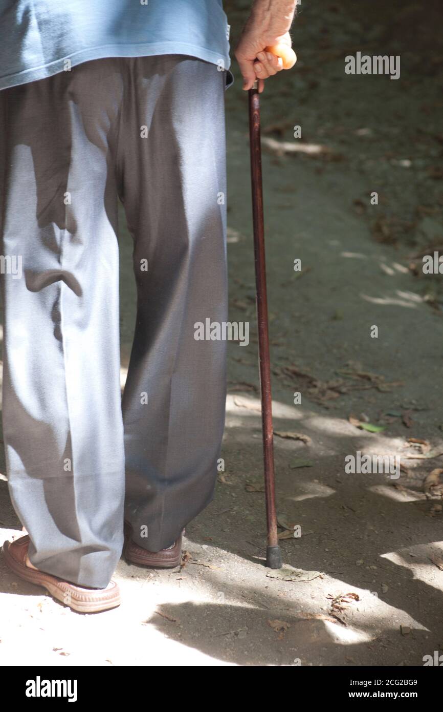 old man with stick Stock Photo - Alamy