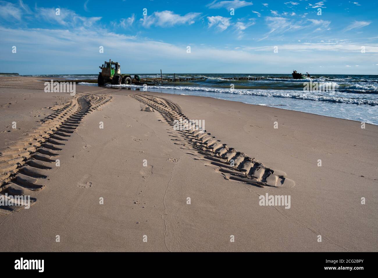 Boat tractor on the coast of Baltic sea Stock Photo - Alamy