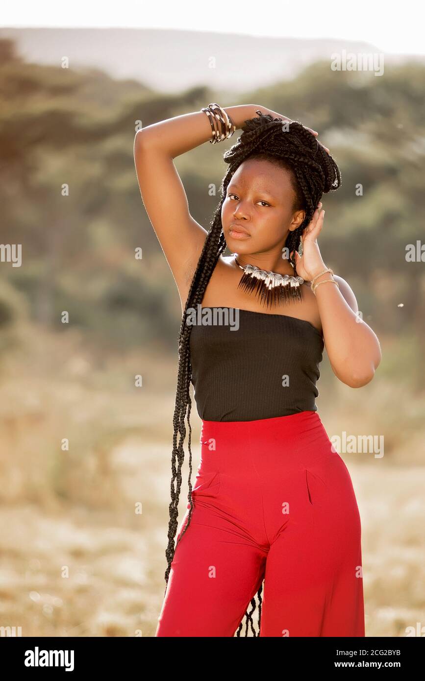 successful black woman model in african safari with african jewellery ...