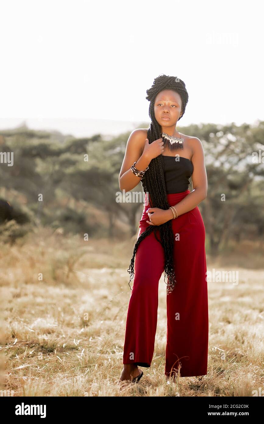successful black woman model in african safari with african jewellery ...