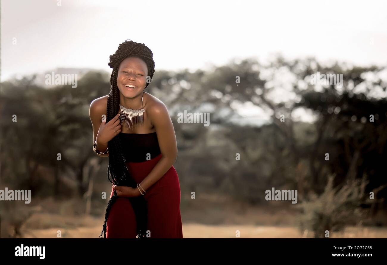 successful black woman model in african safari with african jewellery ...
