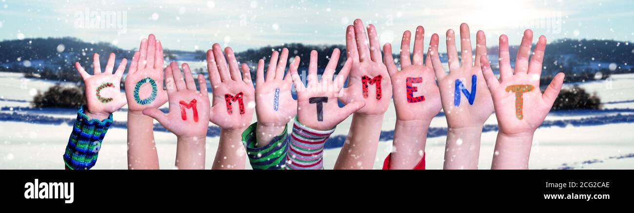 Children Hands Building Word Commitment, Snowy Winter Background Stock ...