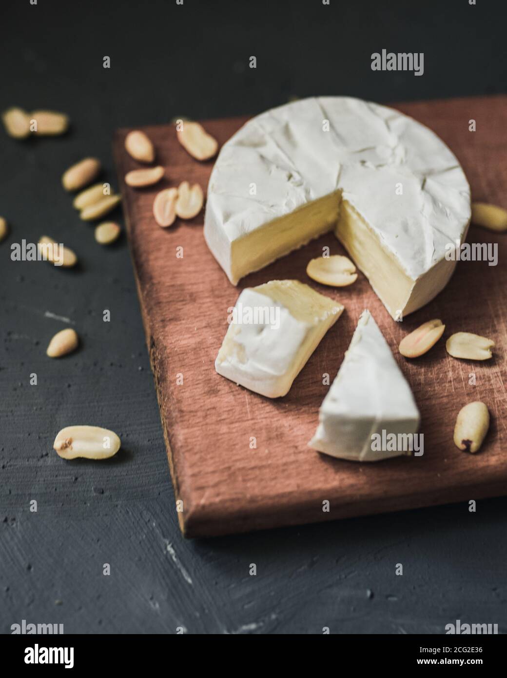 cheese camembert with mold and nuts on wooden board Stock Photo - Alamy