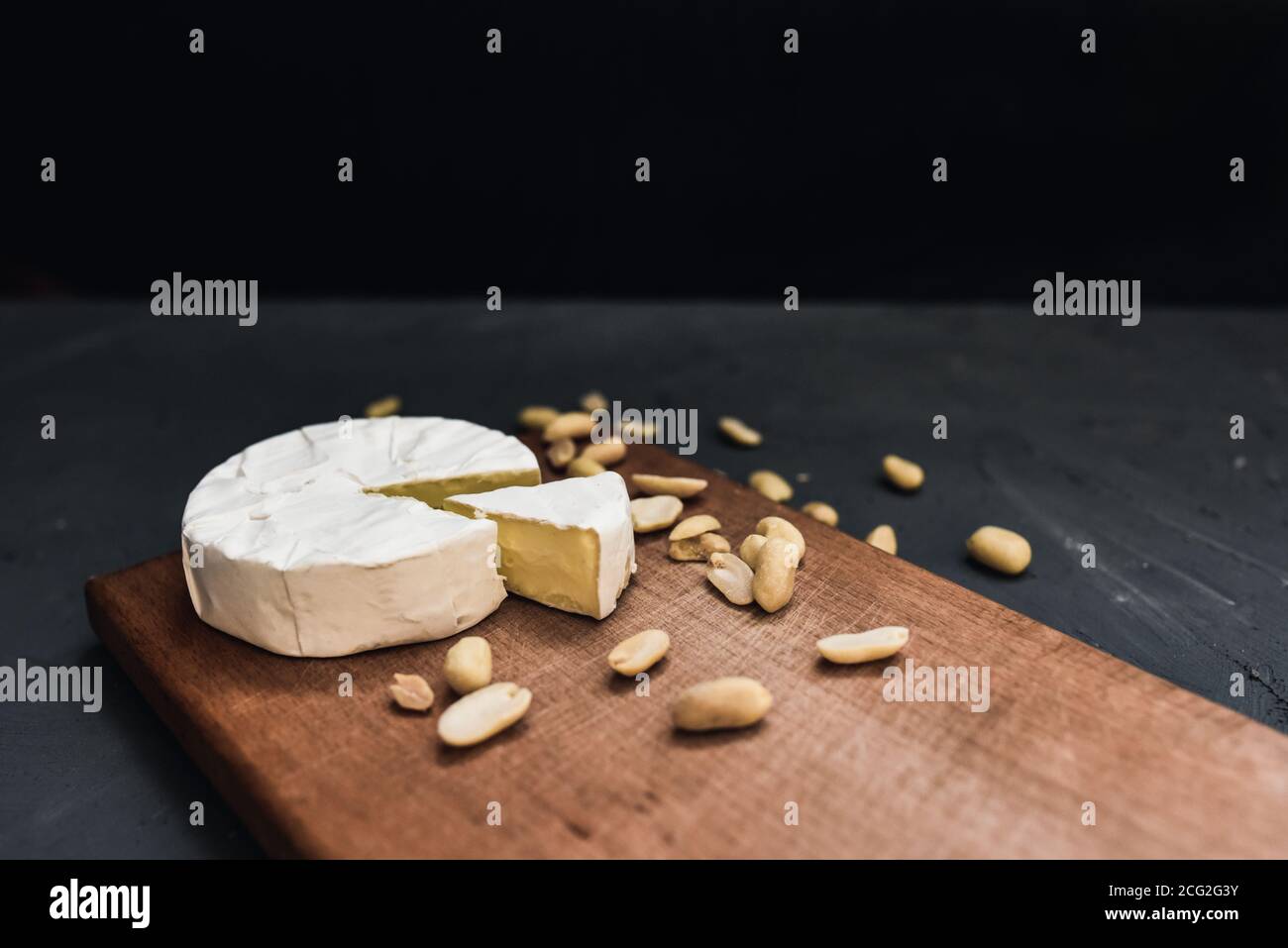 cheese camembert with mold and nuts on wooden board Stock Photo - Alamy