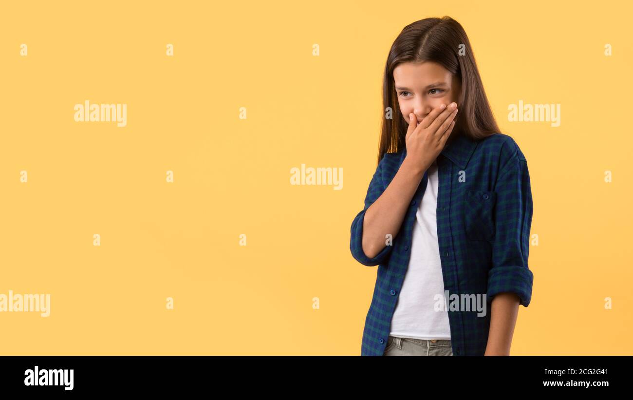 Child hand over mouth hi-res stock photography and images - Alamy