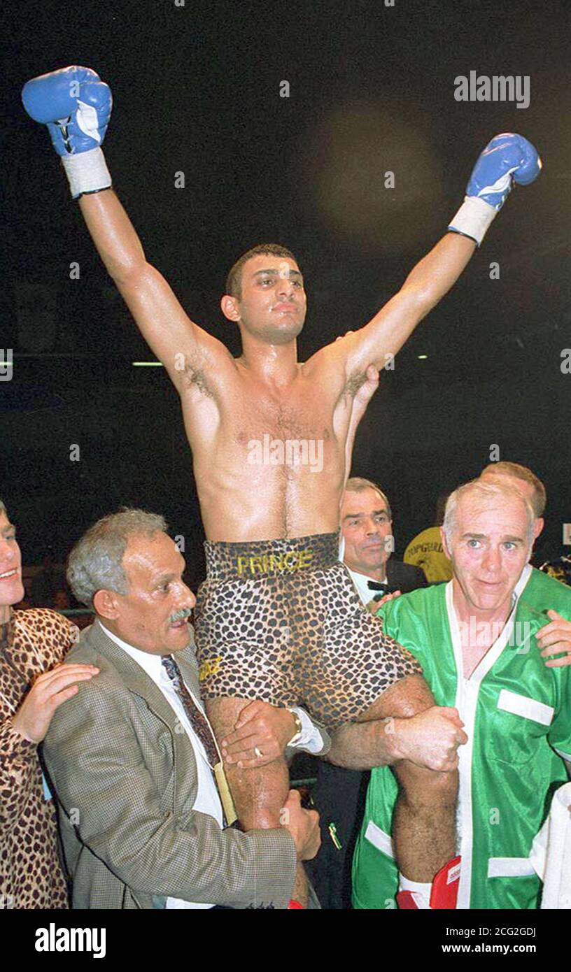 Sheffield's Prince Naseem Hamed holds his arms aloft in celebration ...