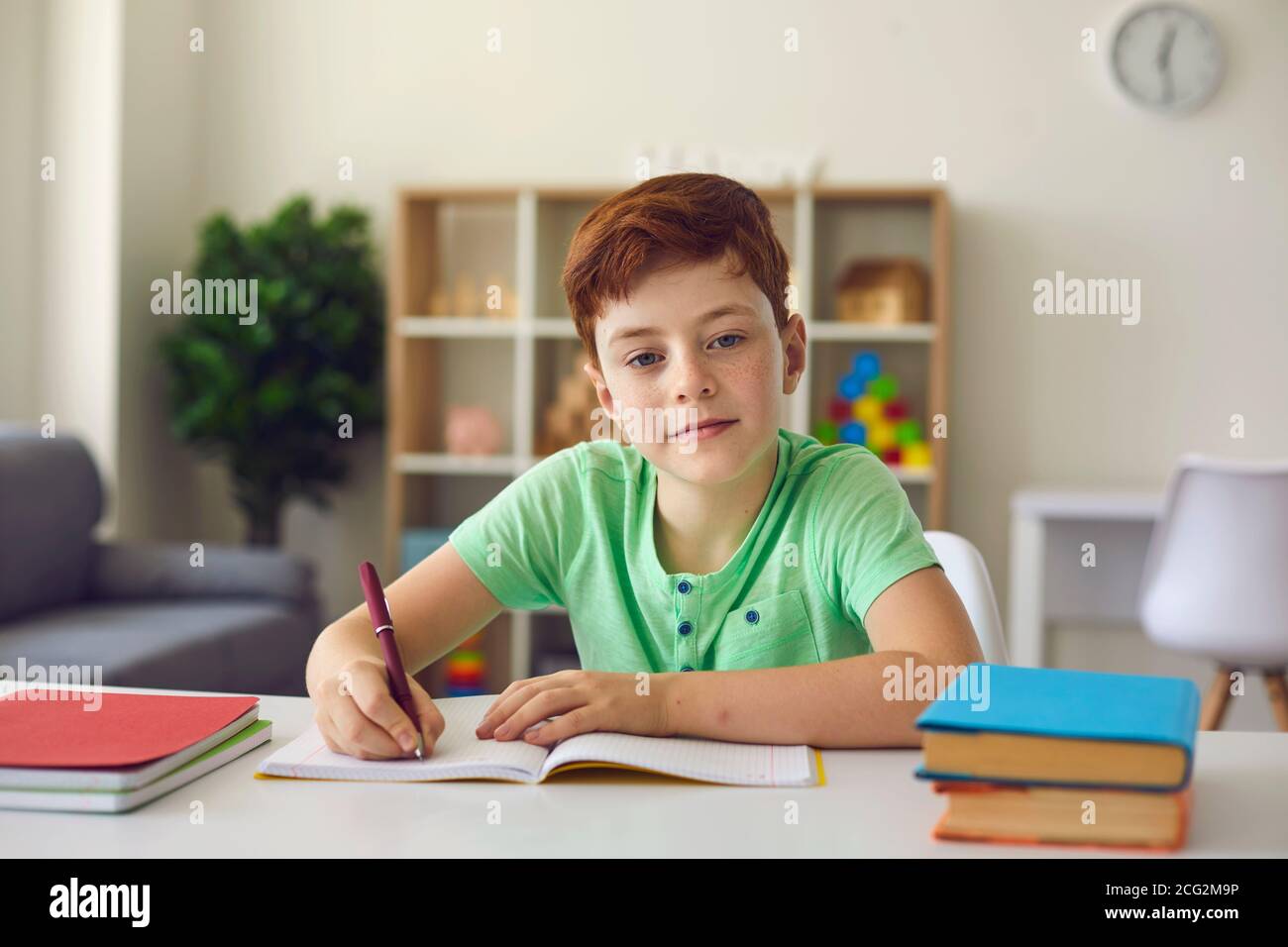 Child serious teacher hi-res stock photography and images - Alamy