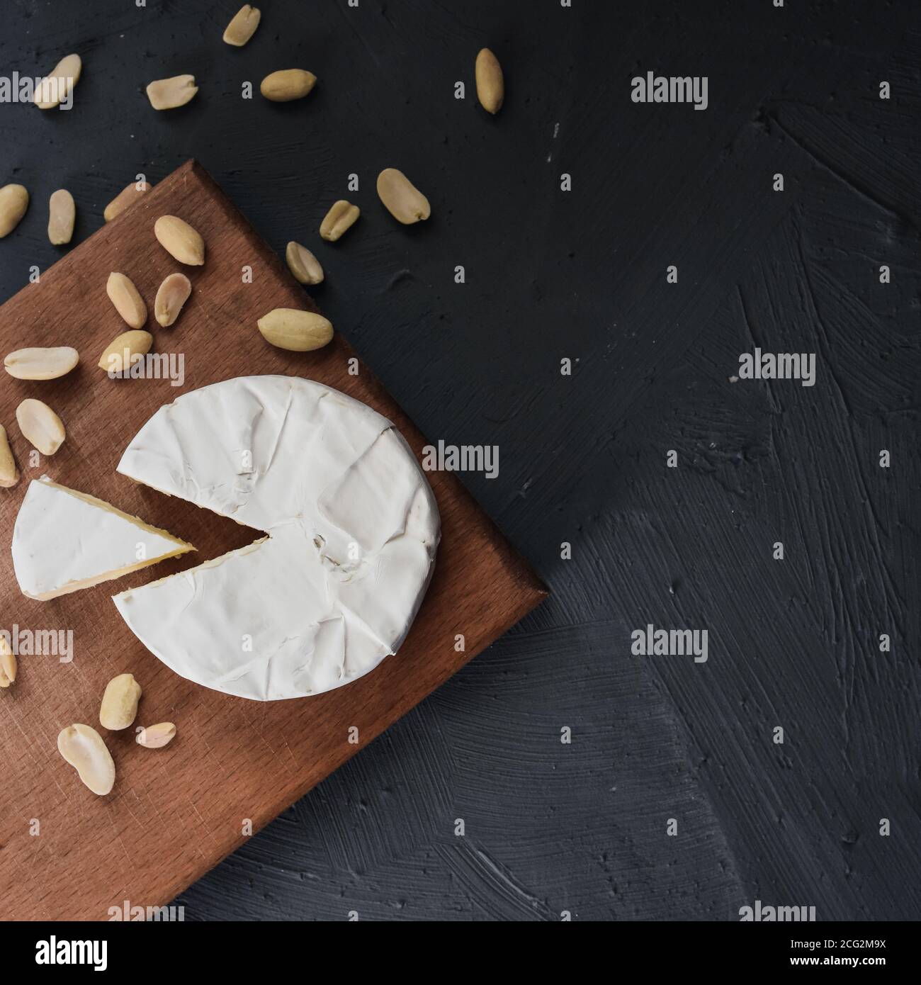 cheese camembert with mold and nuts on wooden board Stock Photo - Alamy
