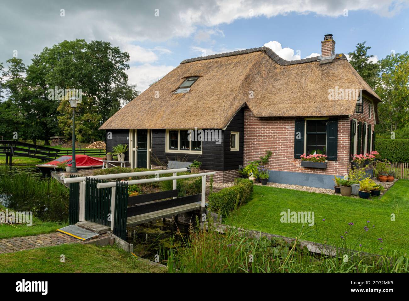 Giethoorn, The Netherlands - August 28, 2020: Bridge in front of a ...