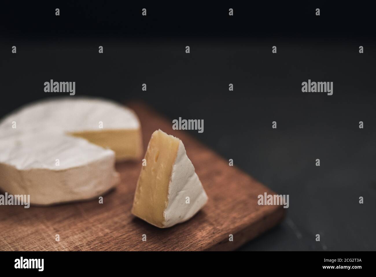 cheese camembert with mold on cutting board Stock Photo - Alamy