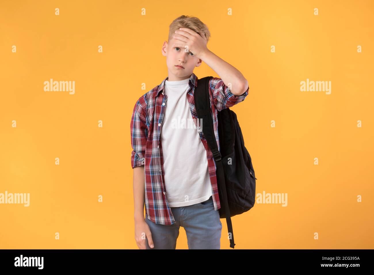 Sick Schoolboy Touching Forehead Having Fever And Headache Stock Photo ...