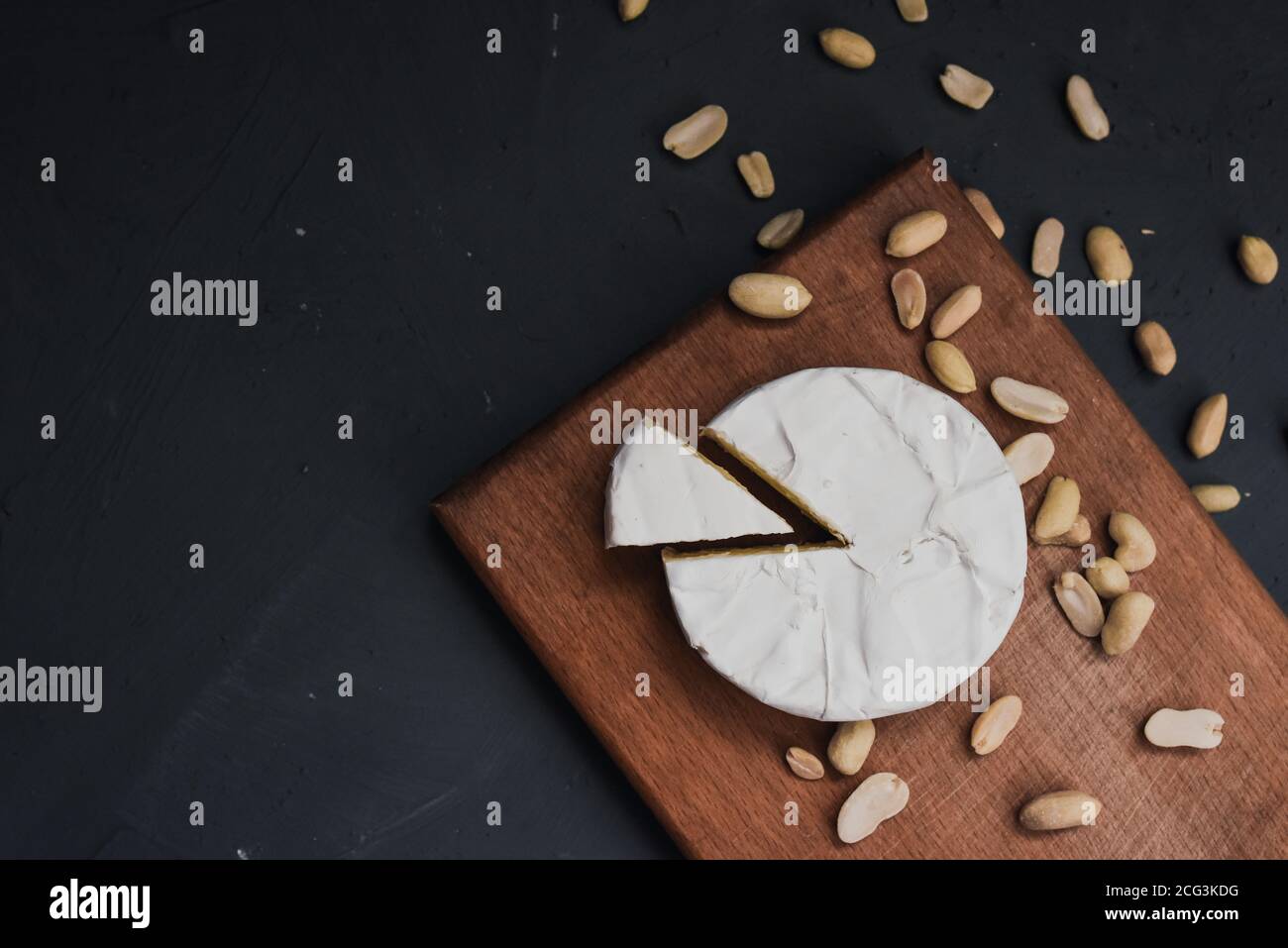 cheese camembert with mold and nuts on wooden board Stock Photo - Alamy