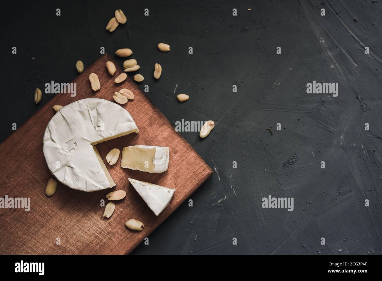 cheese camembert with mold and nuts on wooden board Stock Photo - Alamy