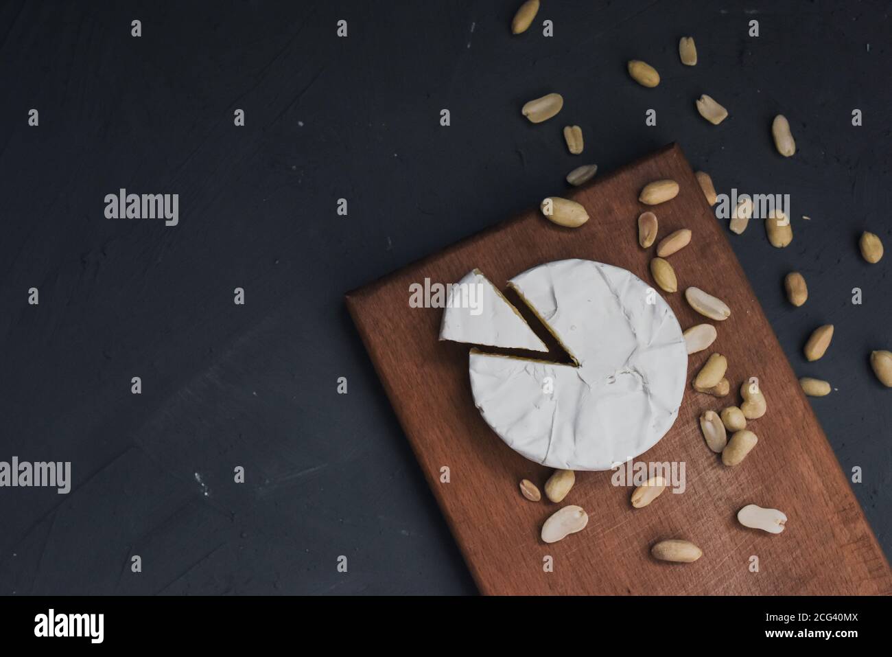 cheese camembert with mold and nuts on wooden board Stock Photo - Alamy
