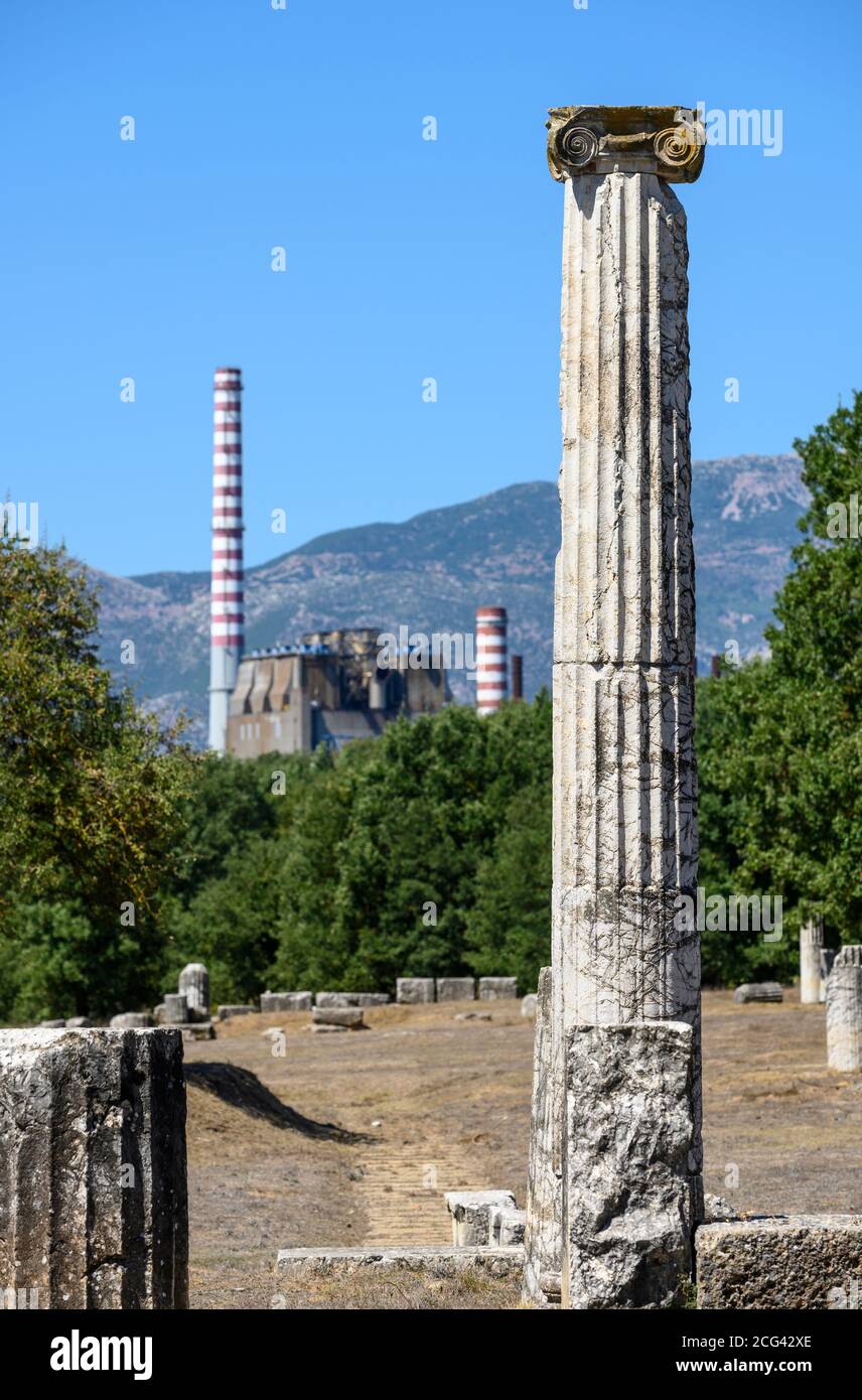 Columns from the ruins of Ancient Megalopolis with the cooling tower ...