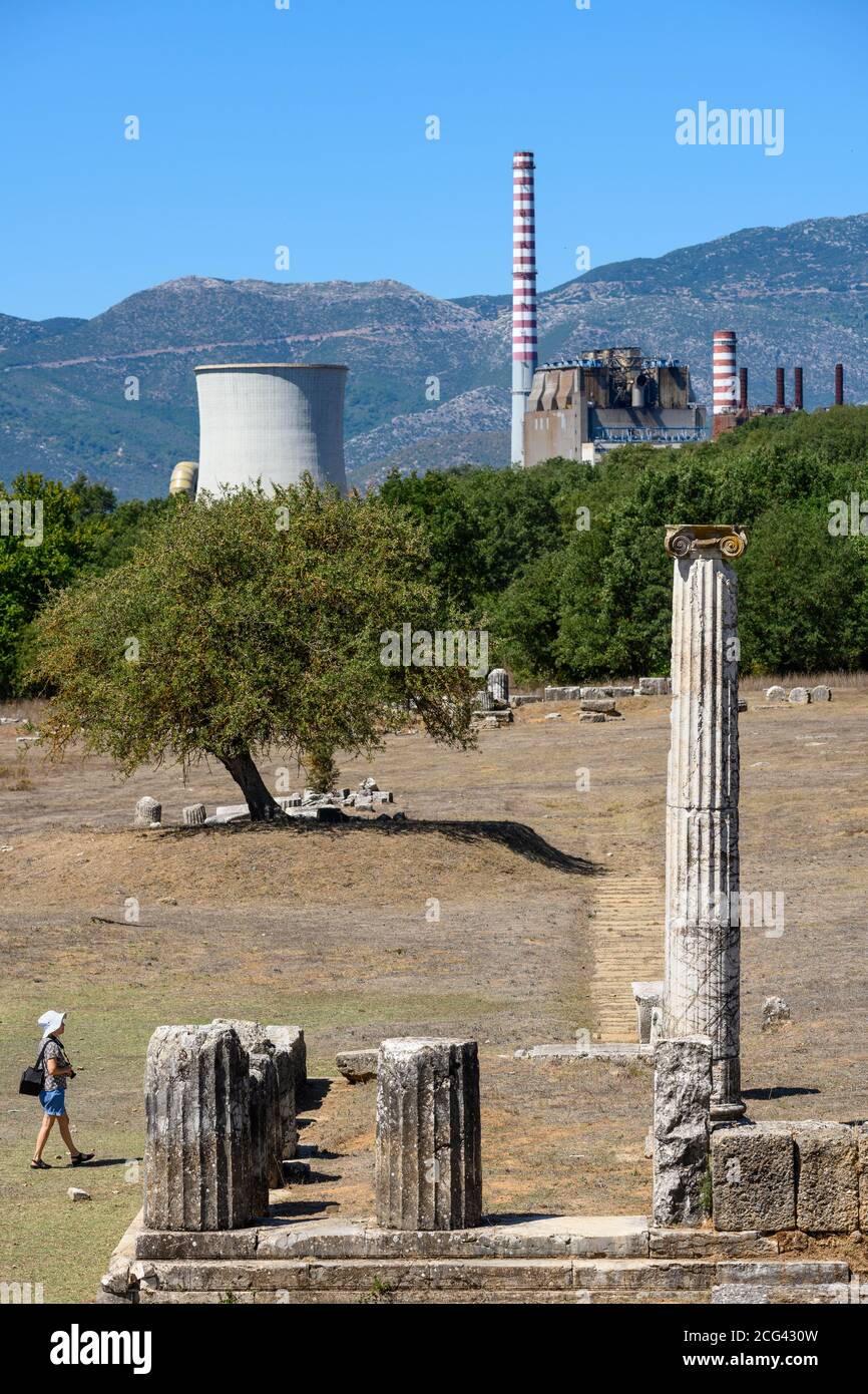 Columns from the ruins of Ancient Megalopolis with the cooling tower ...