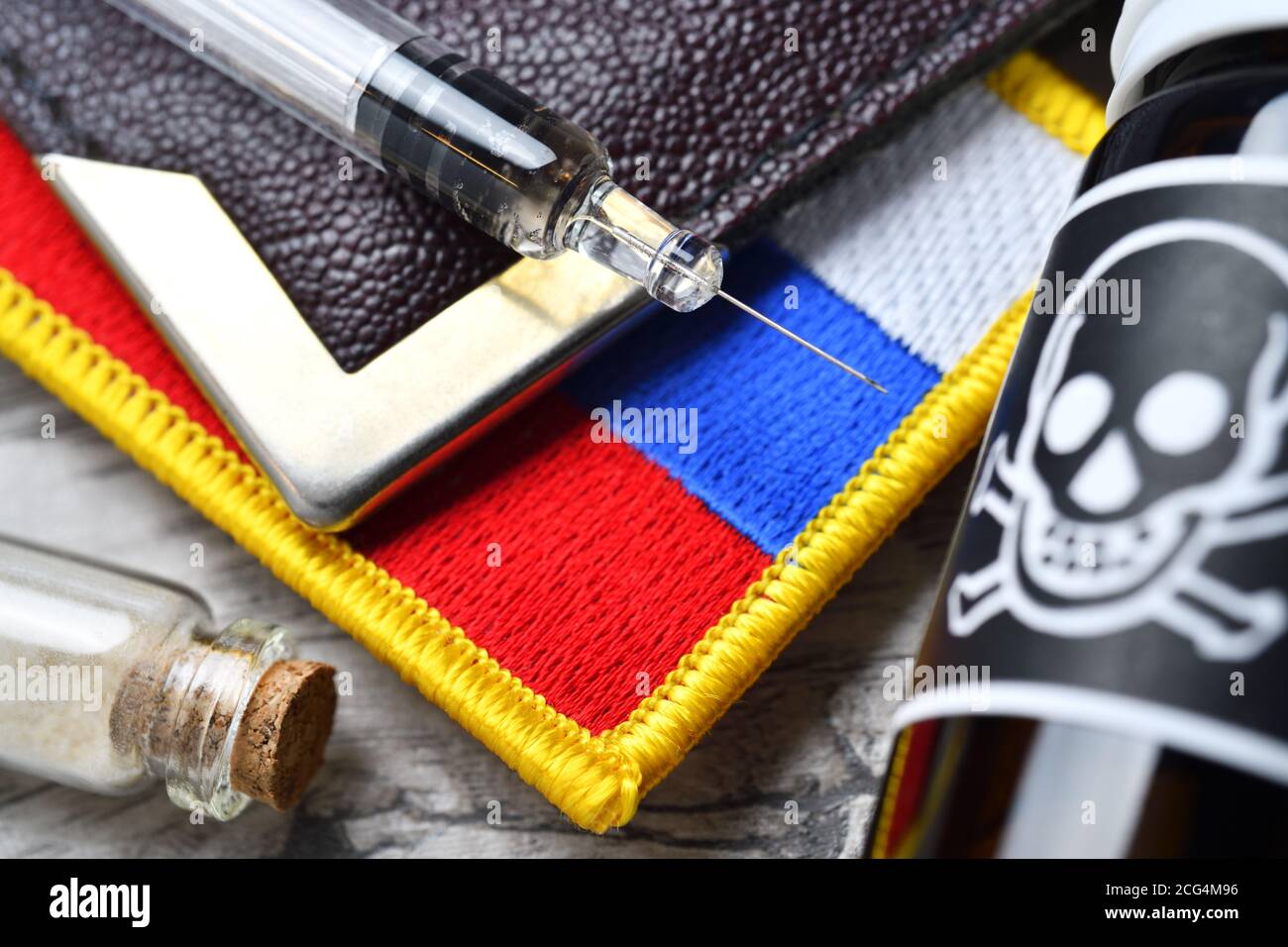 Syringe, poison vial and Russian flag, poison attack Stock Photo - Alamy