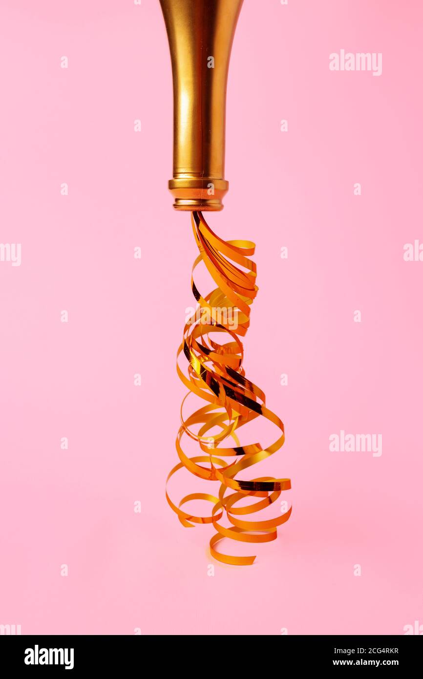 Champagne bottle with streamers flat lay top view Stock Photo - Alamy