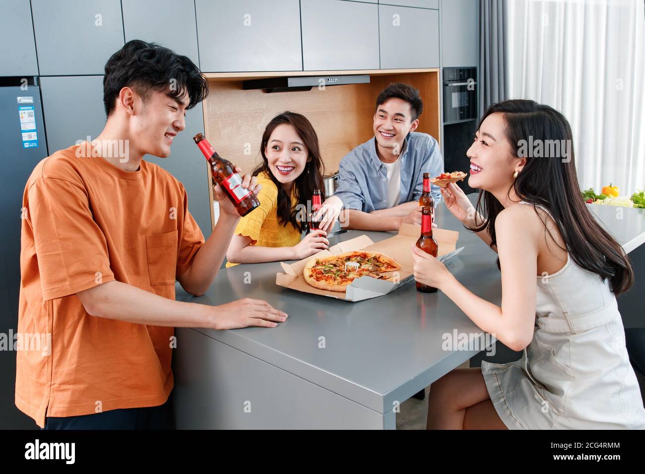 Happy young friends dinner party Stock Photo - Alamy