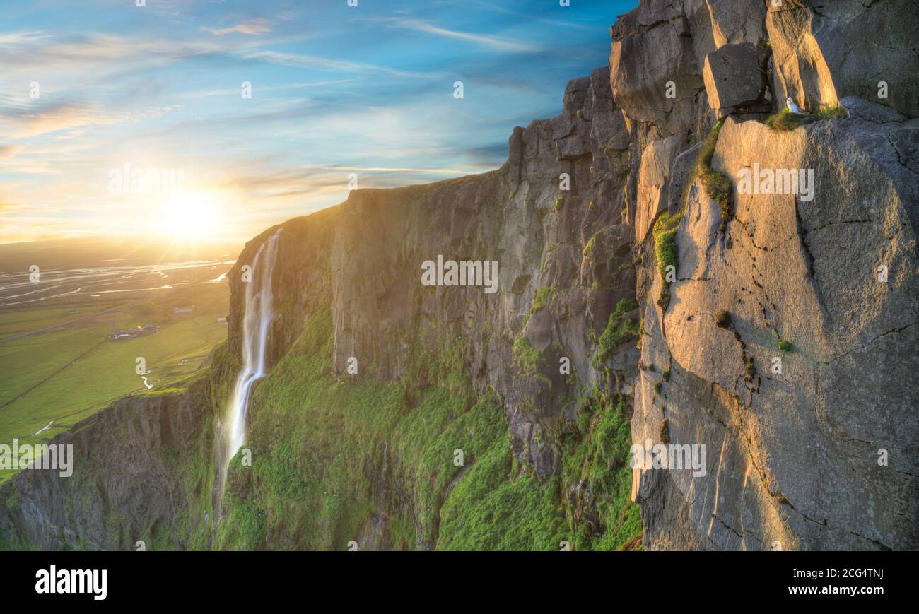 Dramatic top view of waterfall peak, Iceland. Iceland is famous for ...