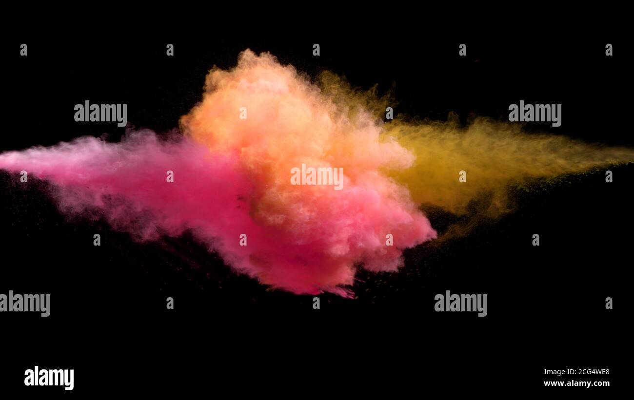 Collision of colored powder isolated on black background. Abstract ...