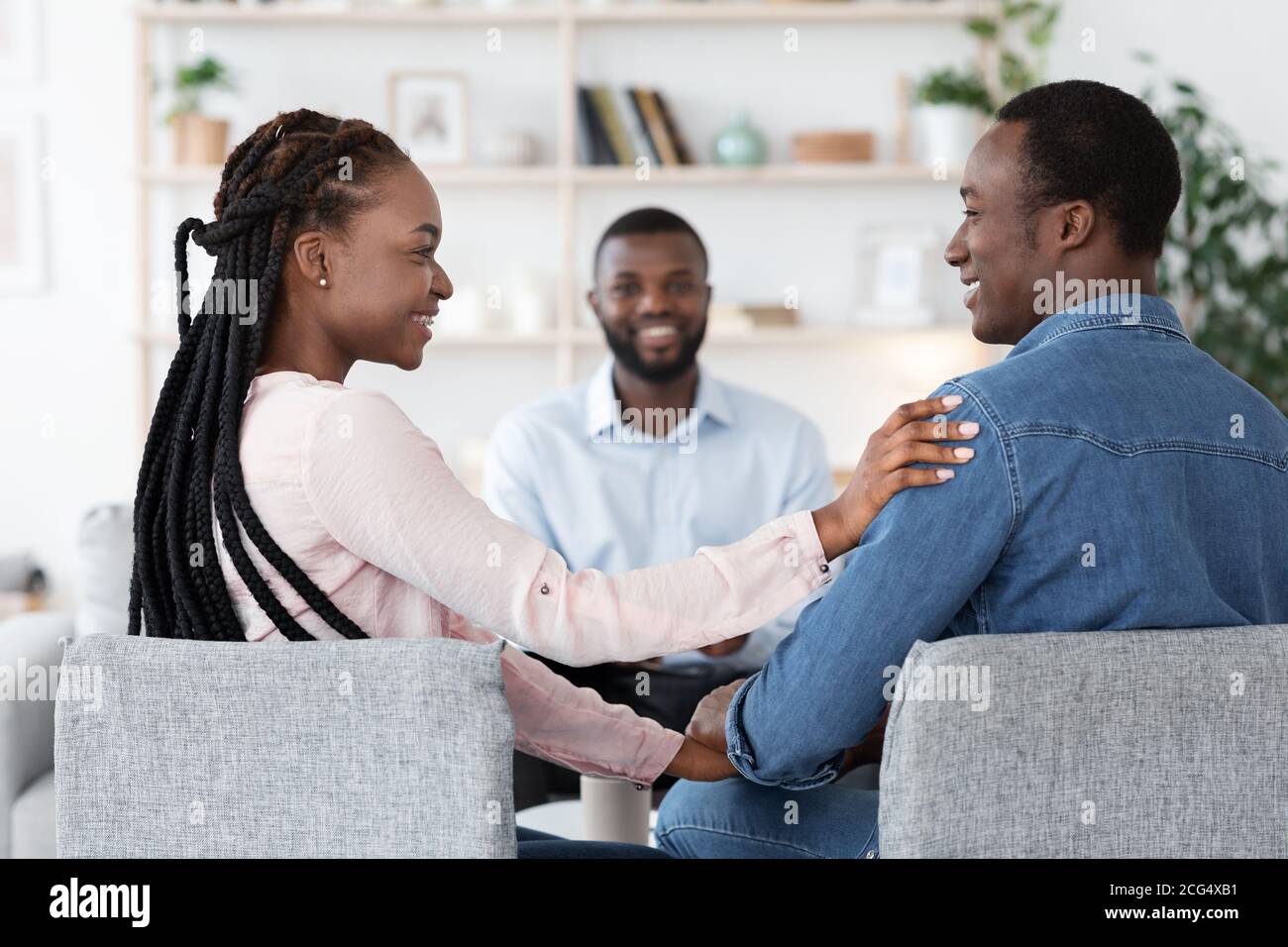 Happy Loving Black Spouses Bonding At Marriage Counselor's Office After ...