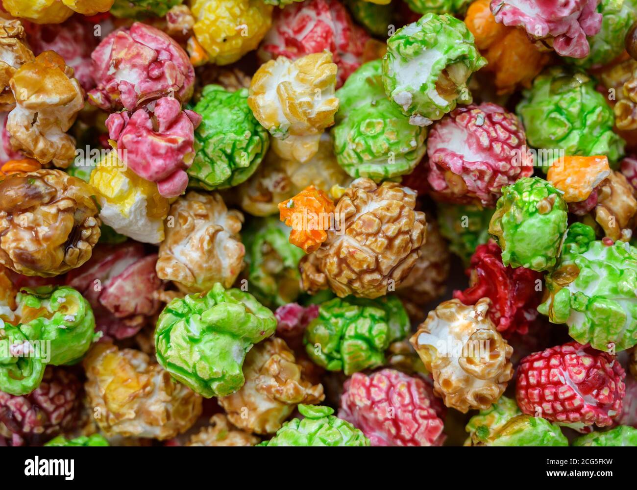 Colorful popcorn - food background. Selective focus Stock Photo - Alamy