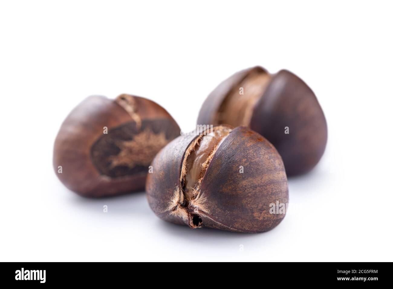 Delicious peeled roasted chestnuts isolated on white background Stock ...