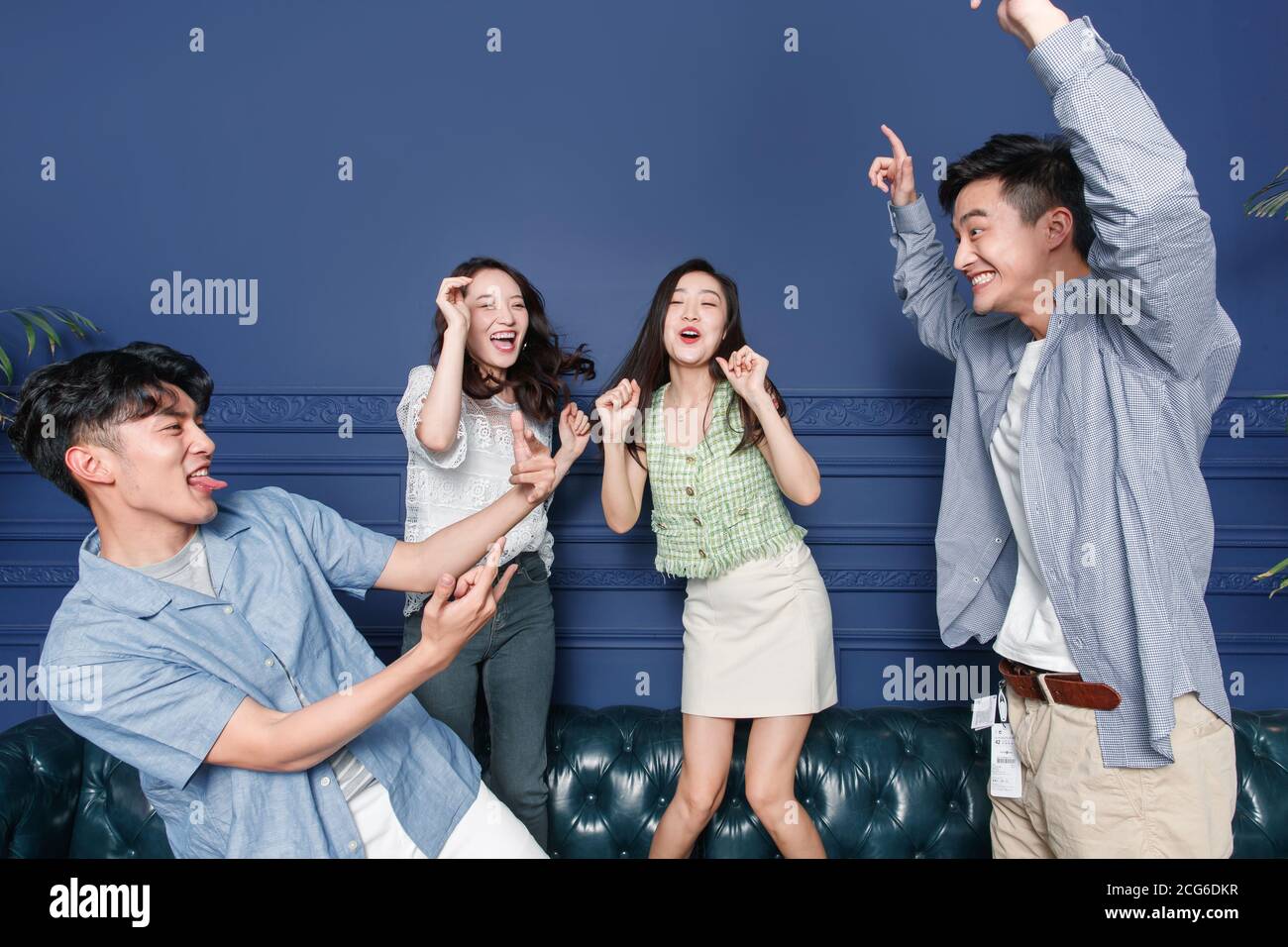 Young friend happy dance together Stock Photo - Alamy
