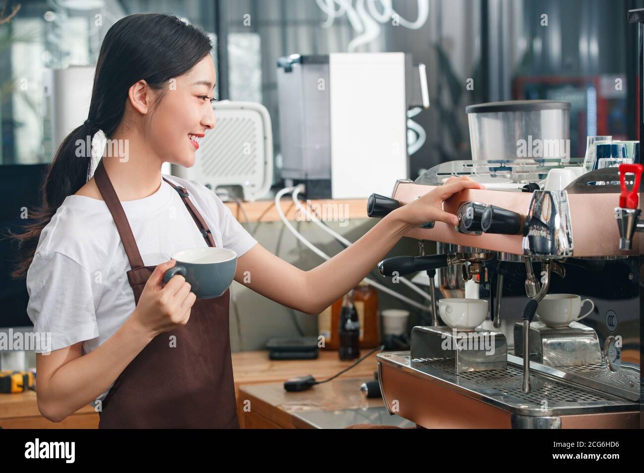 Barista coffee making Stock Photo - Alamy