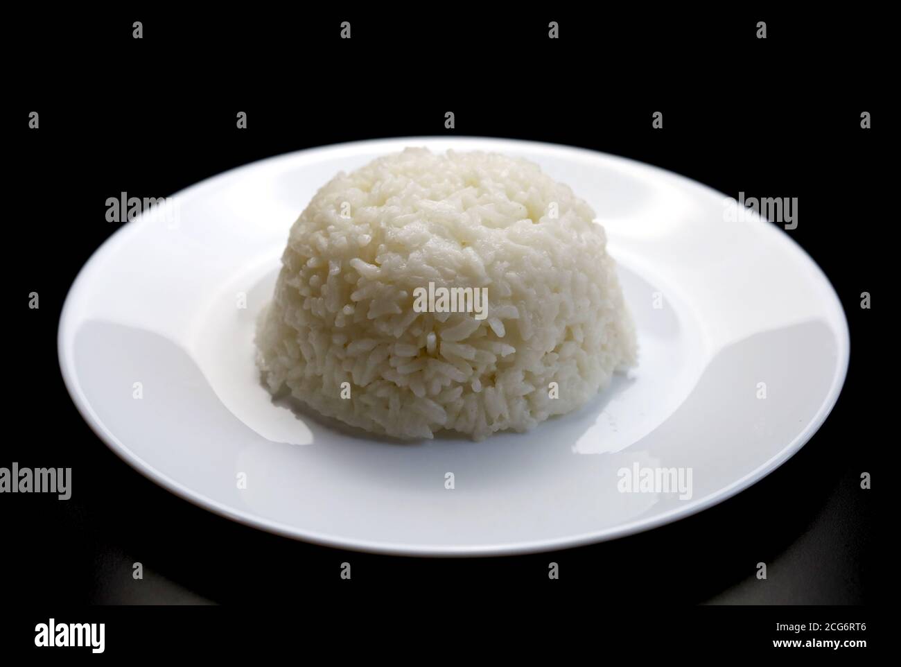 Plain white rice on plate - ready tp eat Stock Photo - Alamy