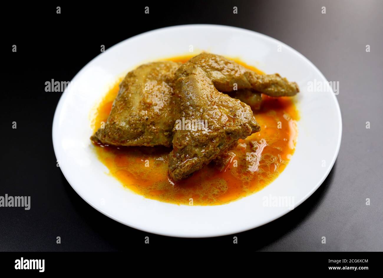 Delicious Chicken Curry - -Ayam Gulai - ready to eat Stock Photo - Alamy