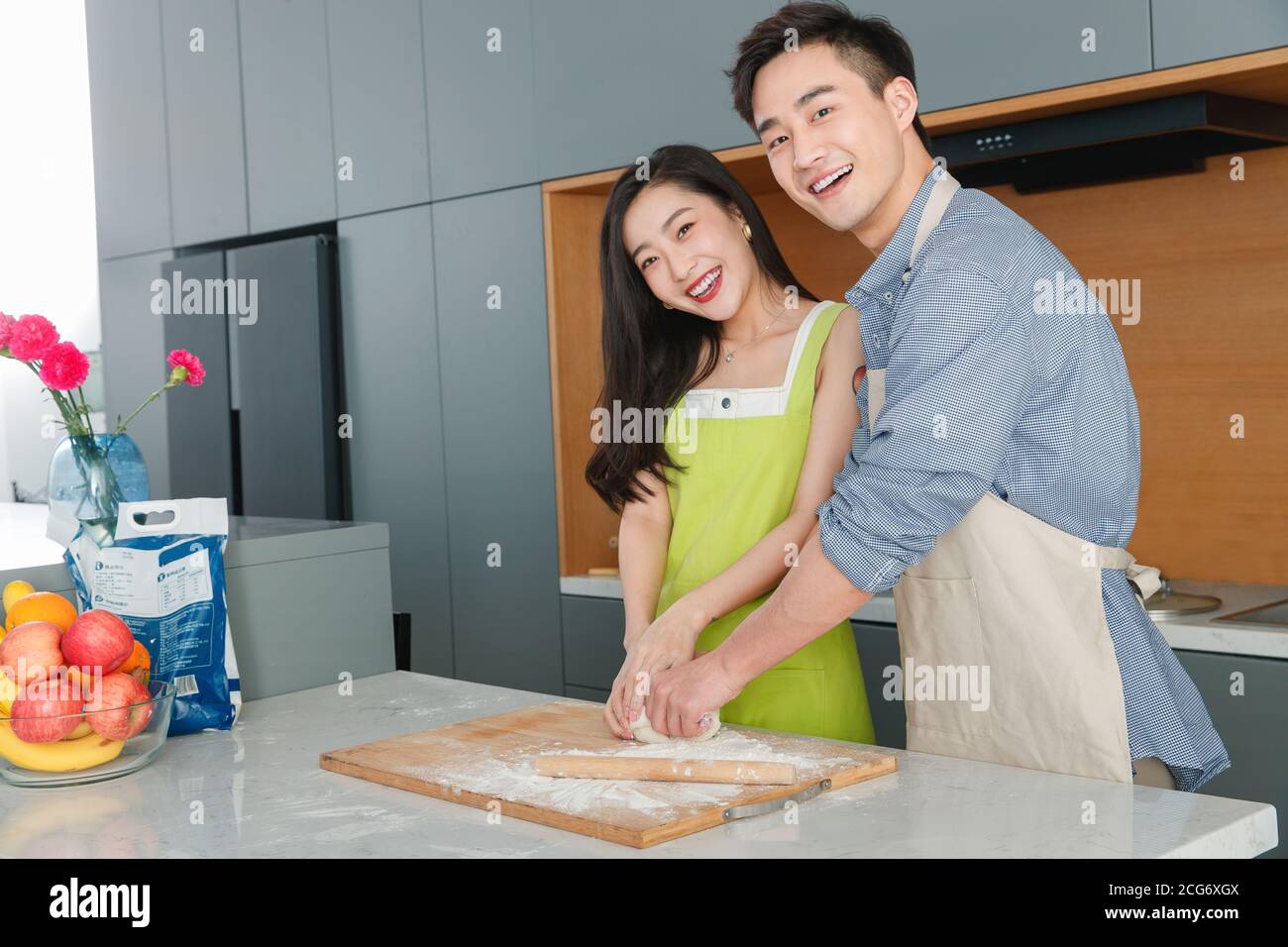 Happy couples cooking hi-res stock photography and images - Alamy