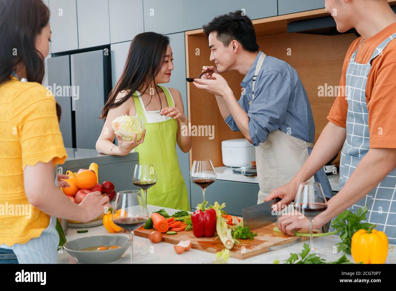 Cooking together happy young man Stock Photo - Alamy